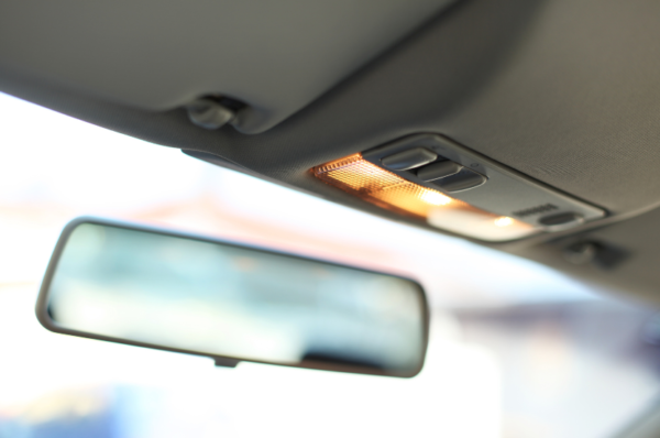 Bonding a Rear View Mirror Mount | Footsteps & Tyretracks